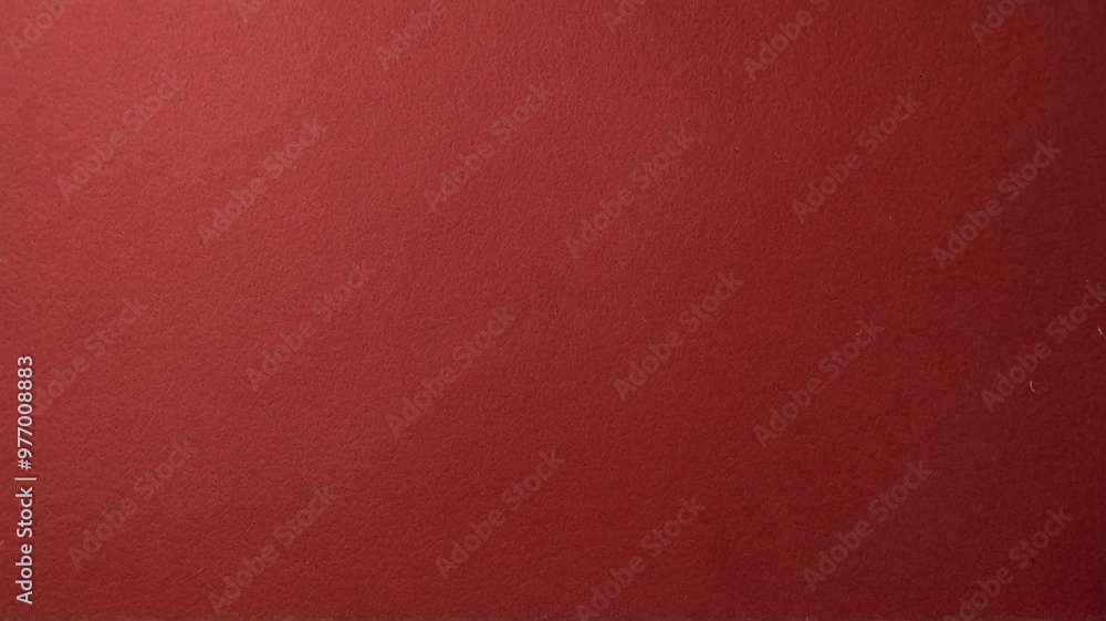 A solid red paper texture useful for various background designs and ...