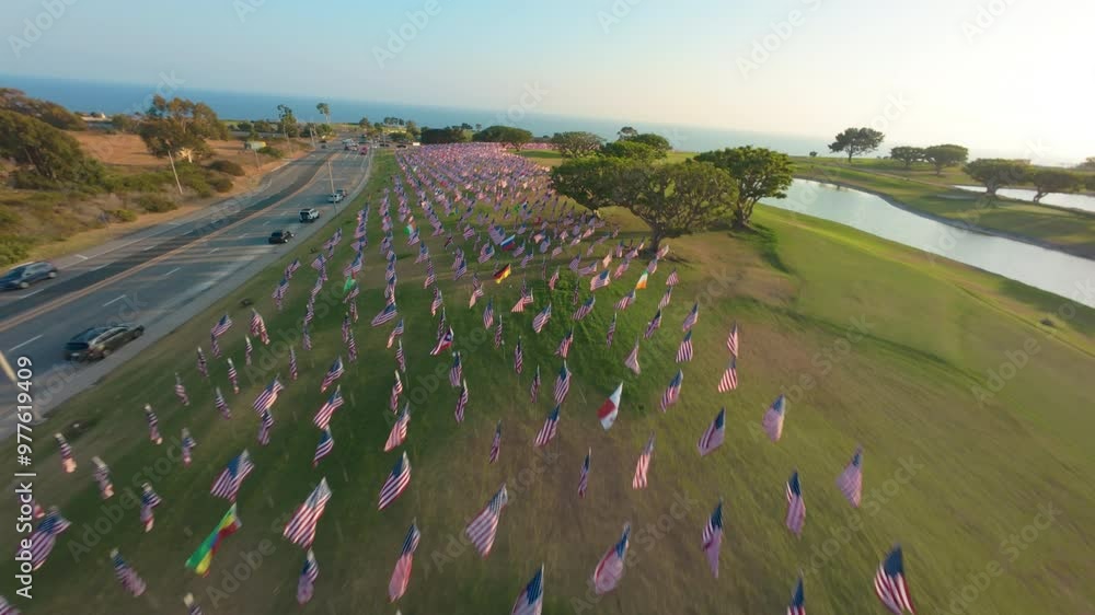 An aerial view shows 3,000 vibrant flags representing different ...