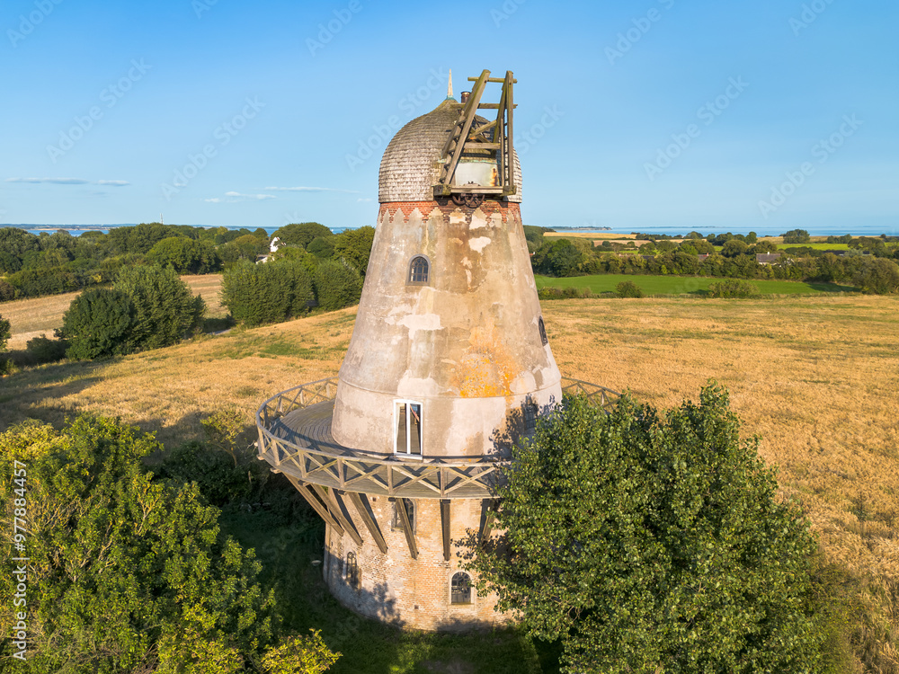 Aerial drone image of medieval derelict abandoned old wind mill ...