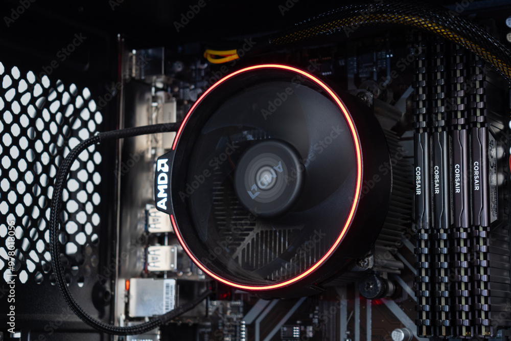 macro photography of a modern AMD Cooler with a beautiful red light and ...