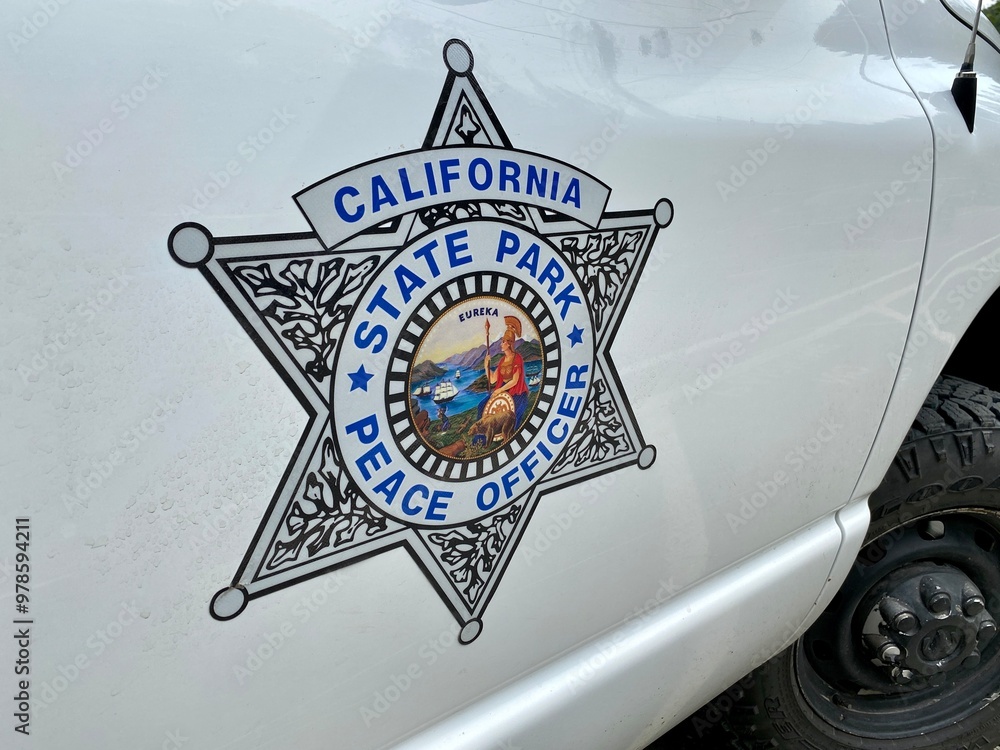 California State Park Peace Office patrol car emblem on side of a ...