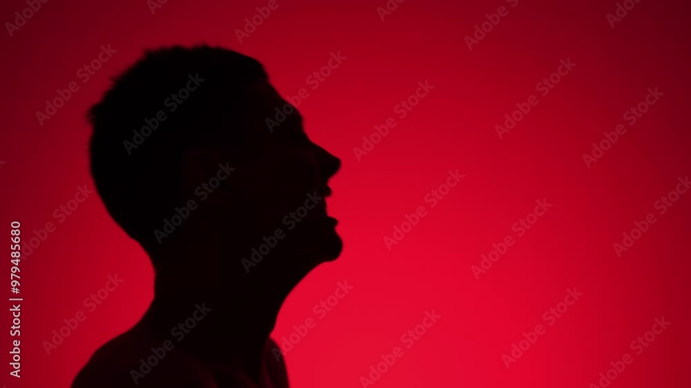 Angry man in despair. Silhouette of a man expressing anger, screaming ...