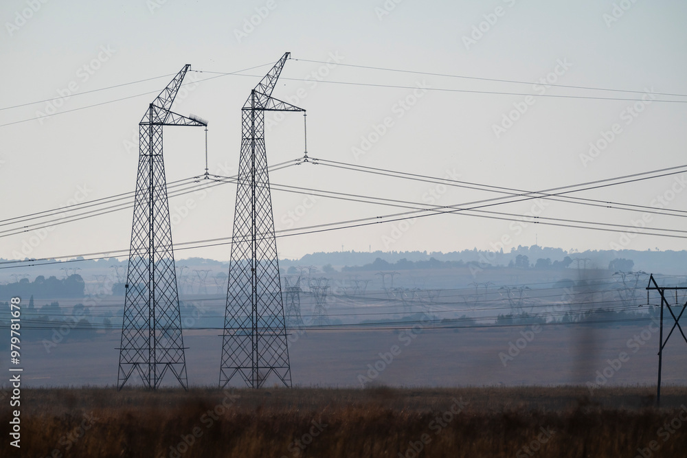 Artistic photos of power pylons standing tall amidst a nature reserve ...