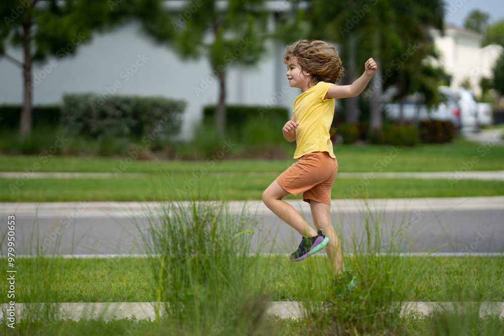 Excited Kid running in street. Amazed child enjoy run. Happy little boy ...