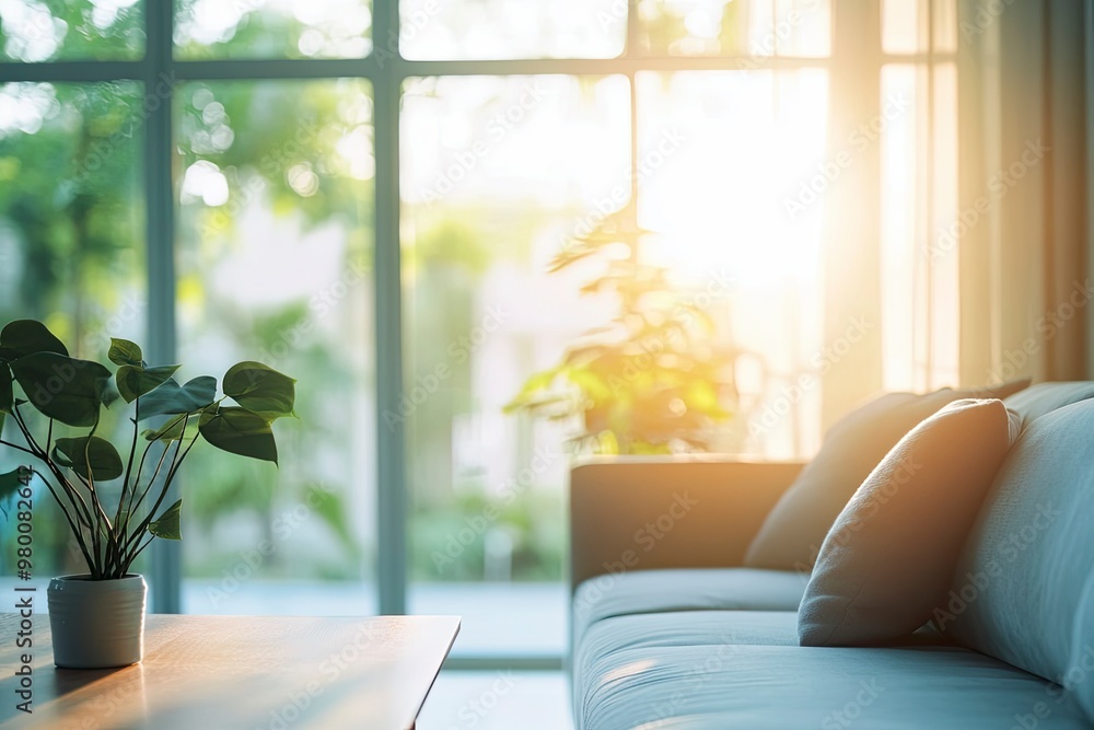 Blur living room at home with morning sunlight at big window for ...