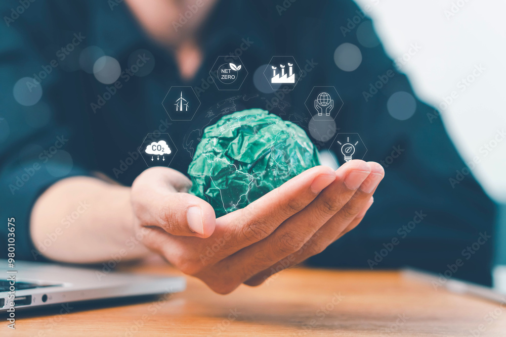 business hands holding the green world for the Sustainable Development ...