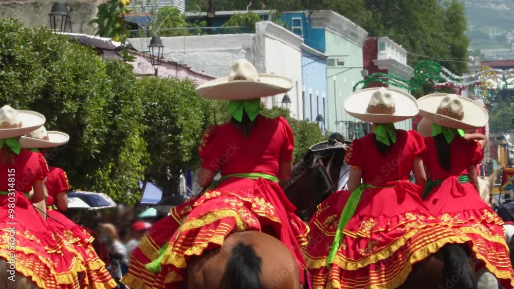 group of mexican teen girls riding horse back wearing colorful mexican ...
