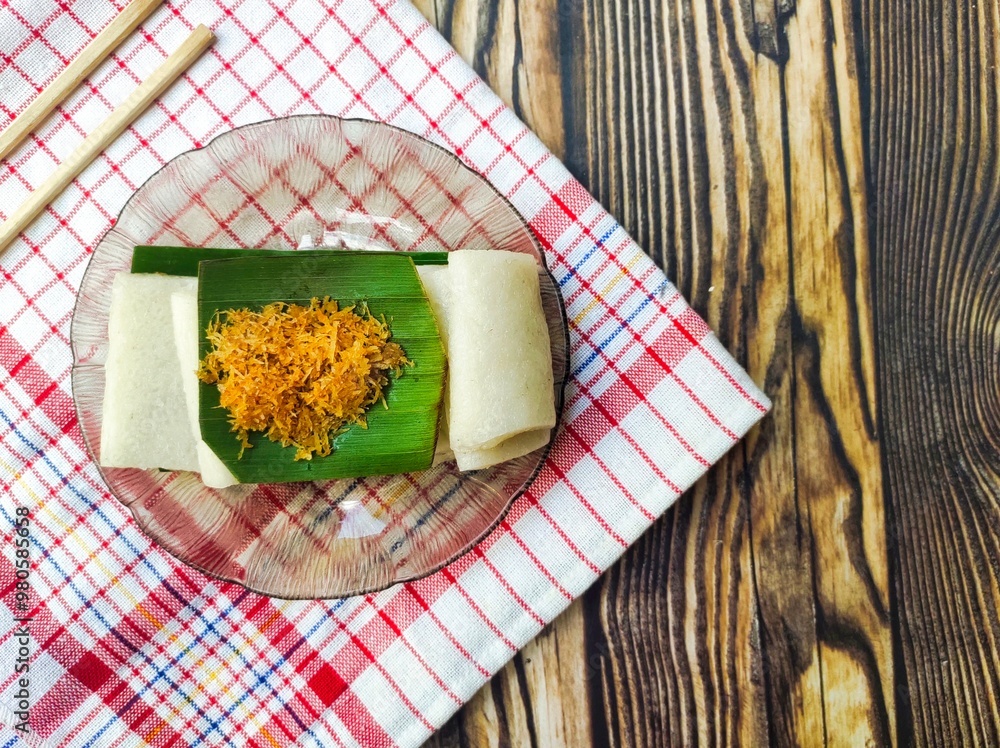 Jadah, a traditional Javanese cake, is made by steaming until cooked ...