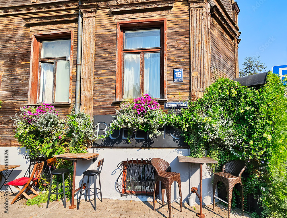 LATVIA, RIGA, 18, SEPTEMBER, 2024: Open veranda of a cafe near an old ...