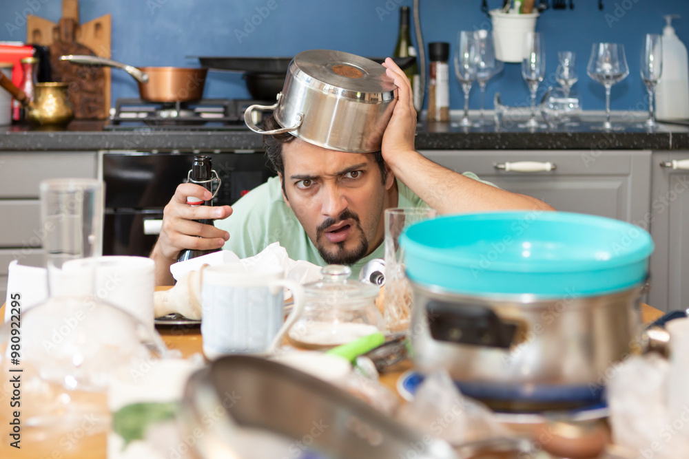 The unfortunate man suffers from a hangover with a terrible headache ...