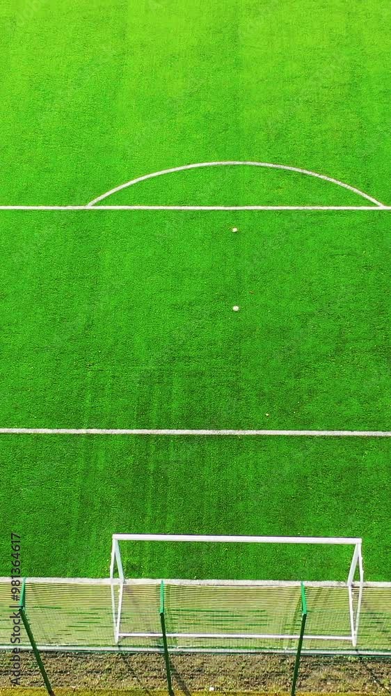 Green football pitch outdoors. Sport stadium for playing team game ...