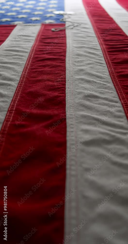 Shiny military dog tags on the red white and blue US American flag ...