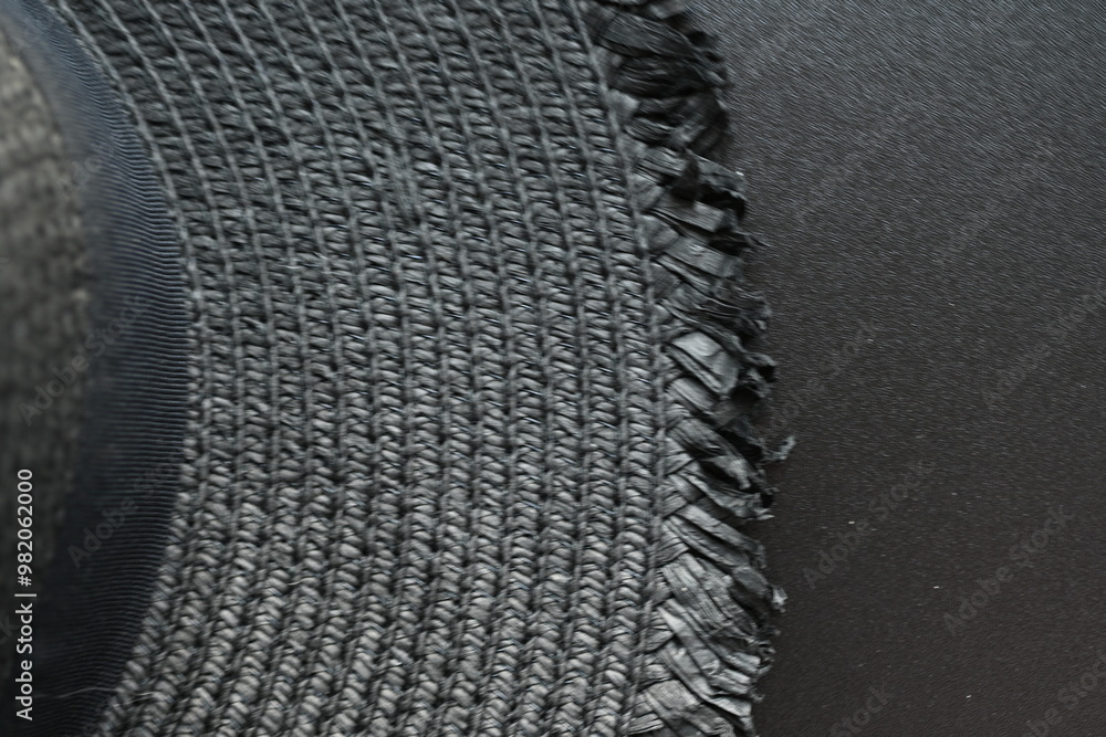 macro black paper hat texture as background, panama hat texture close ...