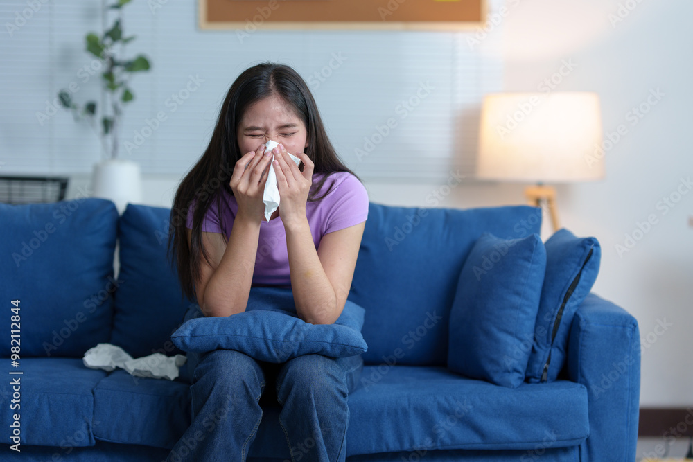 A woman with a sneeze is feeling unwell. Runny nose and sneezing ...