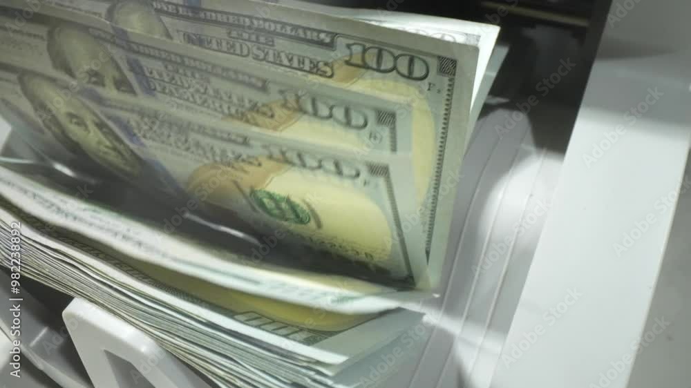 Money counting. Close up currency counting machine counting dollar ...