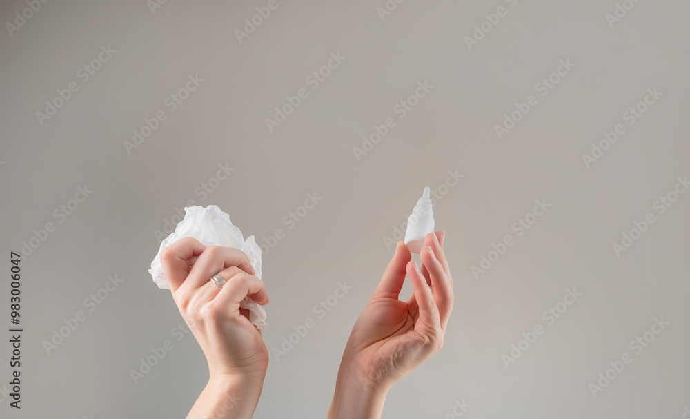 Póster Nasal hygiene with spray, girl clears nasal passages by blowing ...