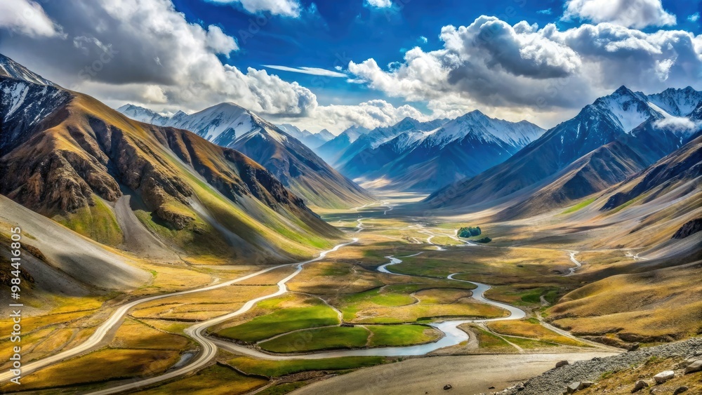 Snow-capped mountains tower above rolling valleys and wind-swept roads ...