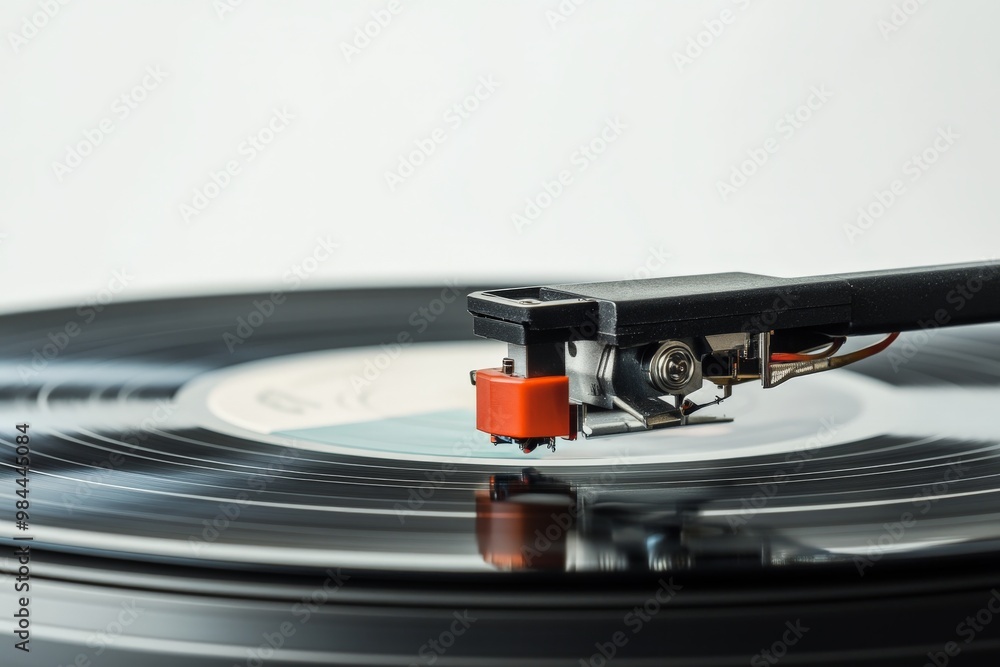 This image illustrates a close-up of a turntable stylus meticulously ...