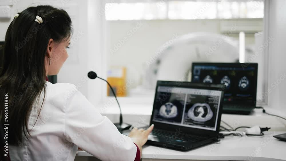 Specialists are diagnosing while watching monitors displaying brain ...