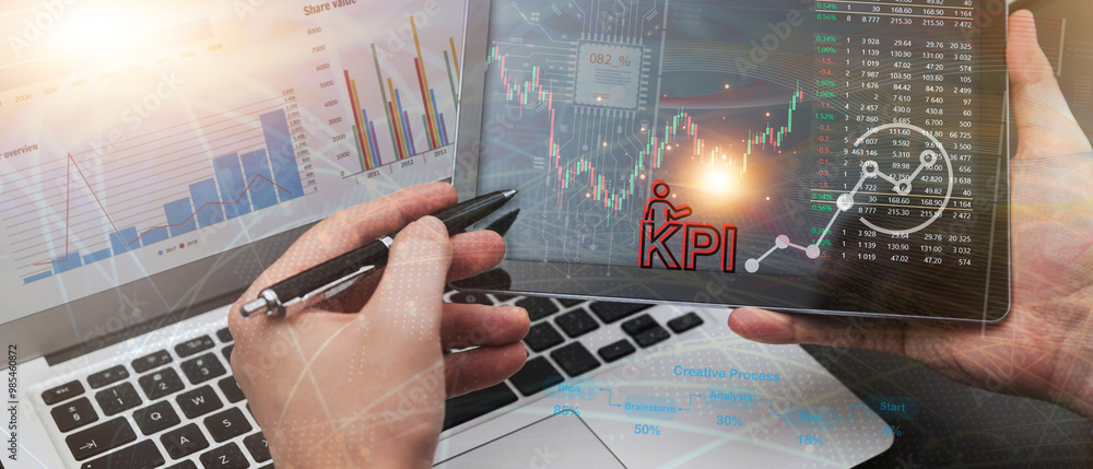 Business analyst using dashboard on computer for data analysis and KPI ...