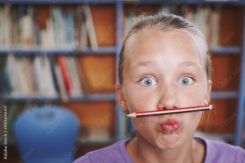 Portrait, funny and girl student with pencil at school library on break ...