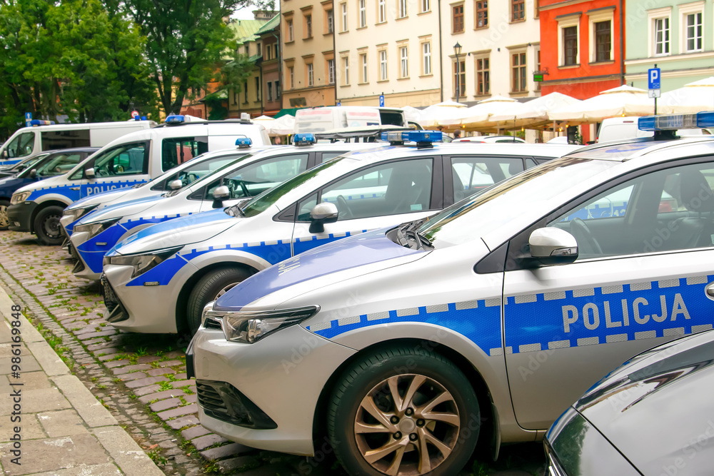 Polish Police cars row parking at city road street for safety residents ...