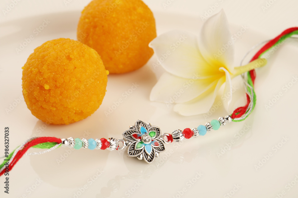 Raksha Bandhan, Indian festival with beautiful Rakhi, Rice Grains and ...