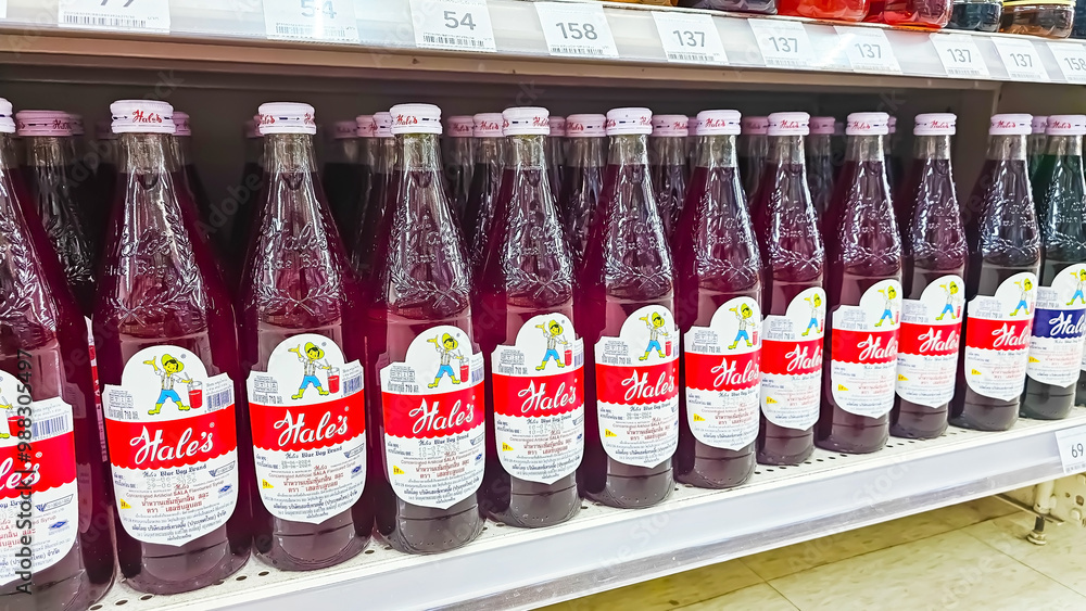 Various flavoured of Hale's Blue Boy syrup on market shelves. Window ...