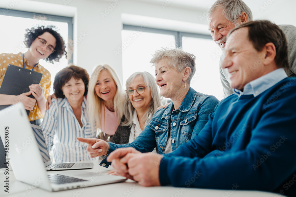 Teacher explaining senior students how to start their own business ...