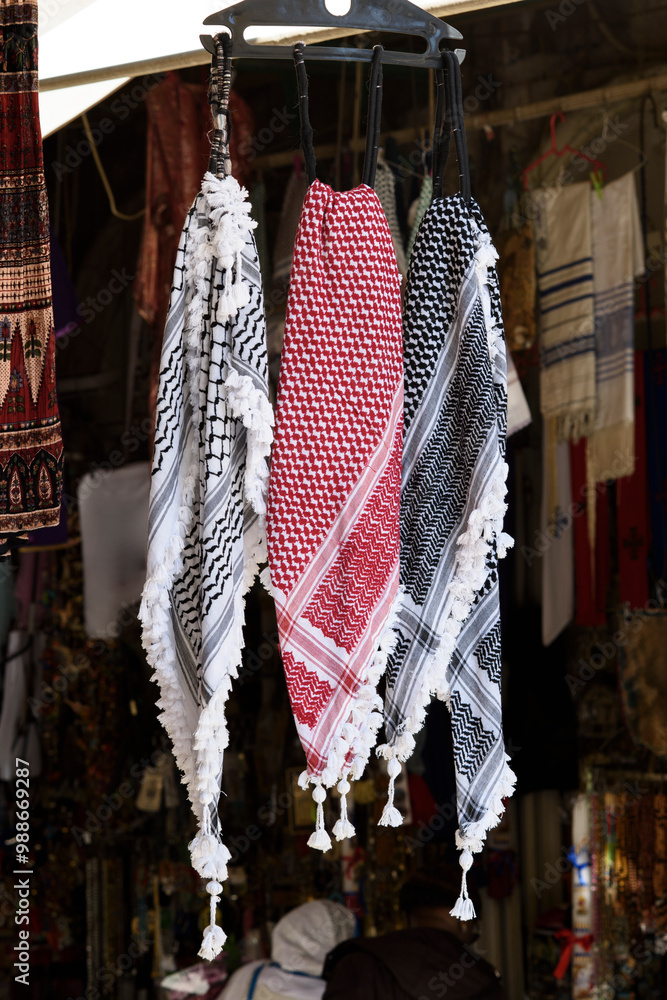 The keffiyeh or kufiyyeh, a traditional headdress worn by men from ...