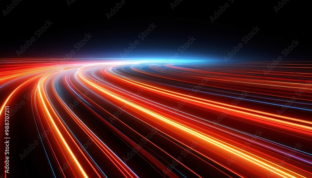 Abstract light trails of car headlights racing around a bend ...