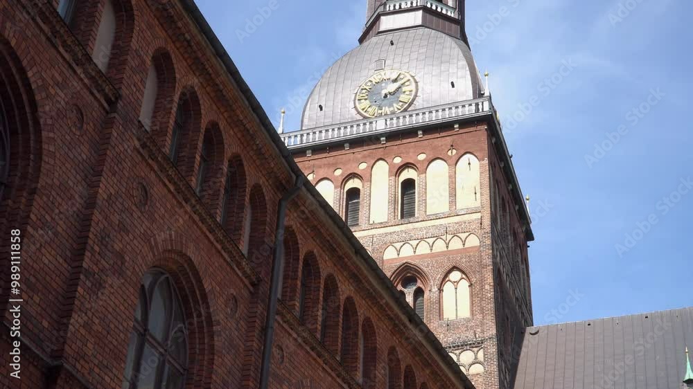 A close-up view of the Riga Dome renaissance-style tower, showcasing ...