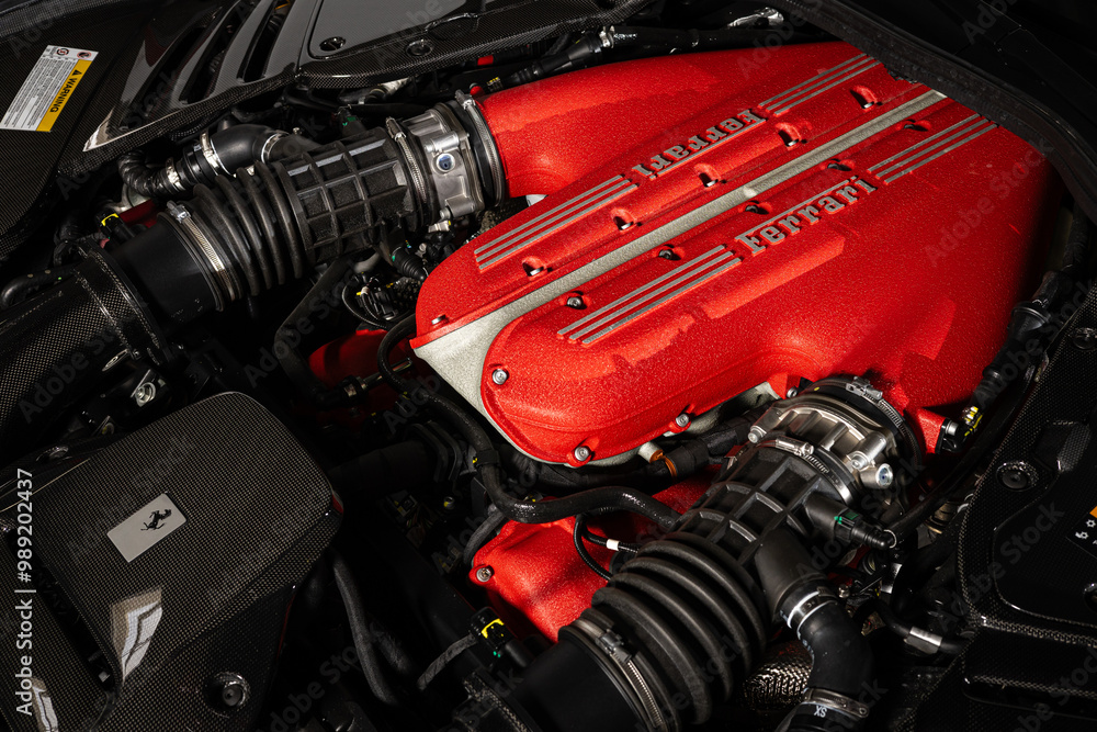 Ferrari. The logo sign of a powerful Ferrari super car. Close up photo ...