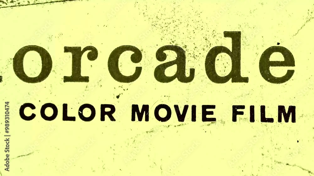 A damaged film frame covered in grain and dust, with dynamic winding ...