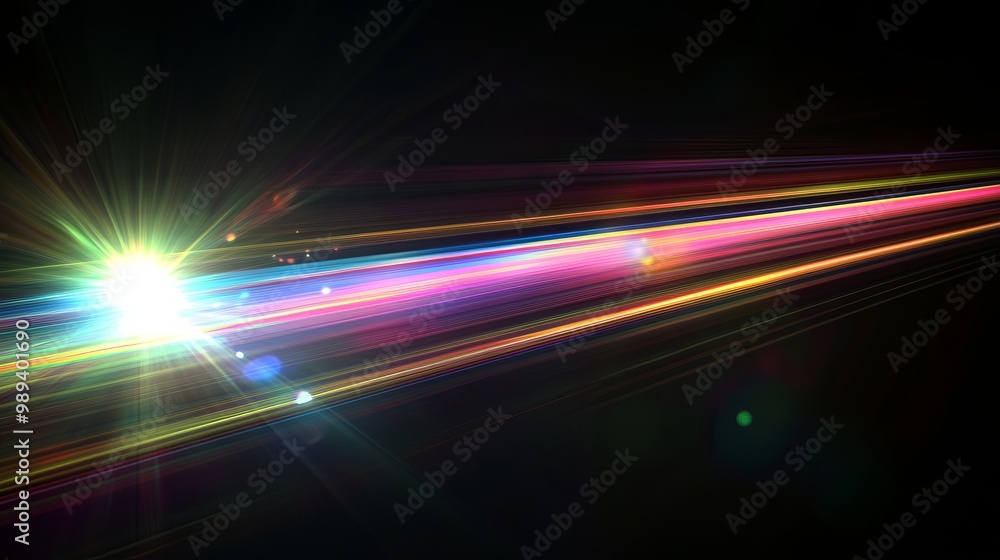 Bright, colorful light streaks against a black background. These are ...