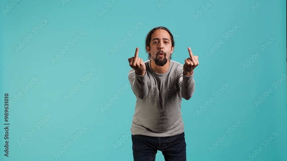 Irked man fighting with friend, doing middle finger sign gesturing ...
