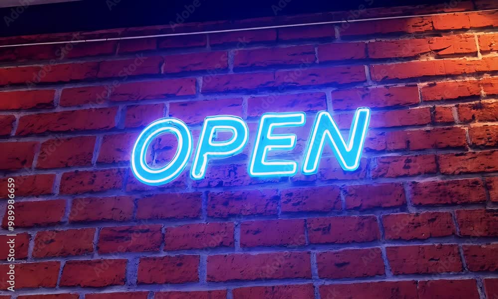 Neon led sign board glows with "open" on a red brick background ...