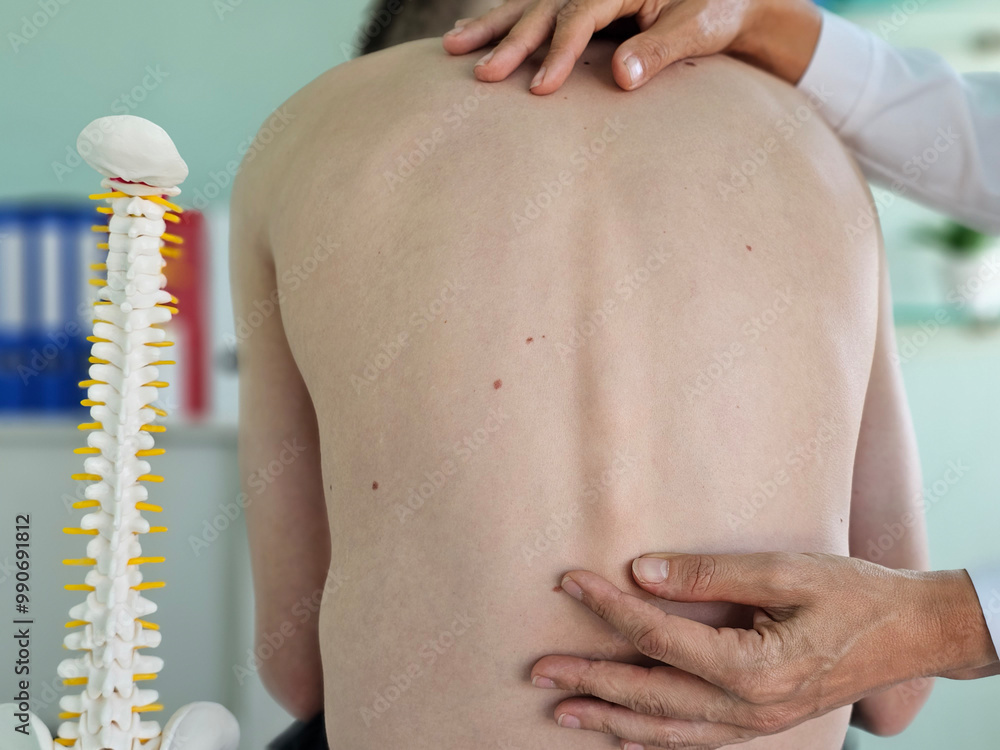 Surgeon Examines Spine And Posture Scoliosis And Spinal Deformities In