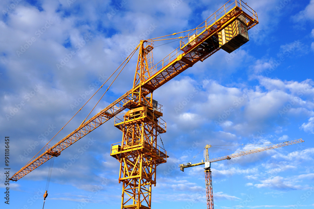 Construction crane on on blue sky background. Tower Crane on building ...
