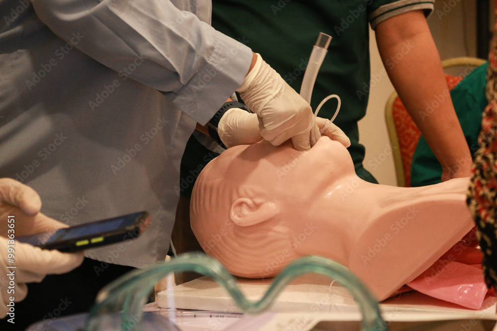 Emergency and first aid class on cpr doll, Cardiac life support Stock ...