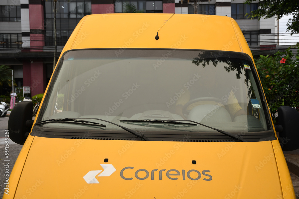 Yellow "Correios" van. Sedex and Correios logo on the car. Correios ...