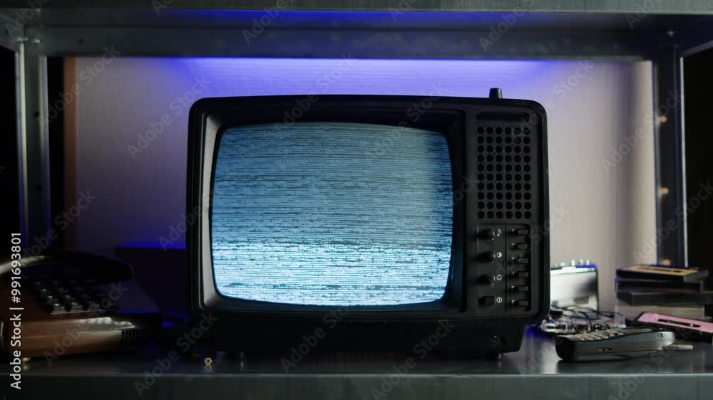 Retro TV, vintage television In a nostalgic setup, a retro TV displays ...