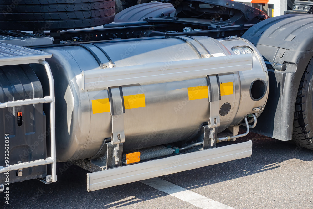 Fuel tank on truck. Fragment of lorry with gasoline tank. Gas equipment ...