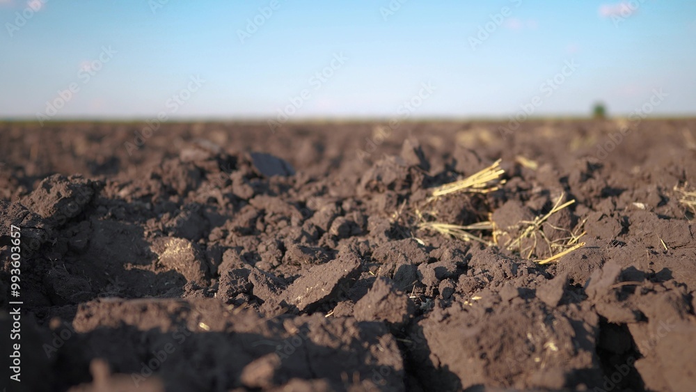 combines plowed field. modern farming and irrigation business concept ...