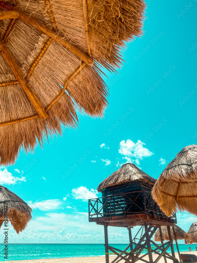 relaxing beachfront with a lifeguard tower in an exotic Caribbean ...