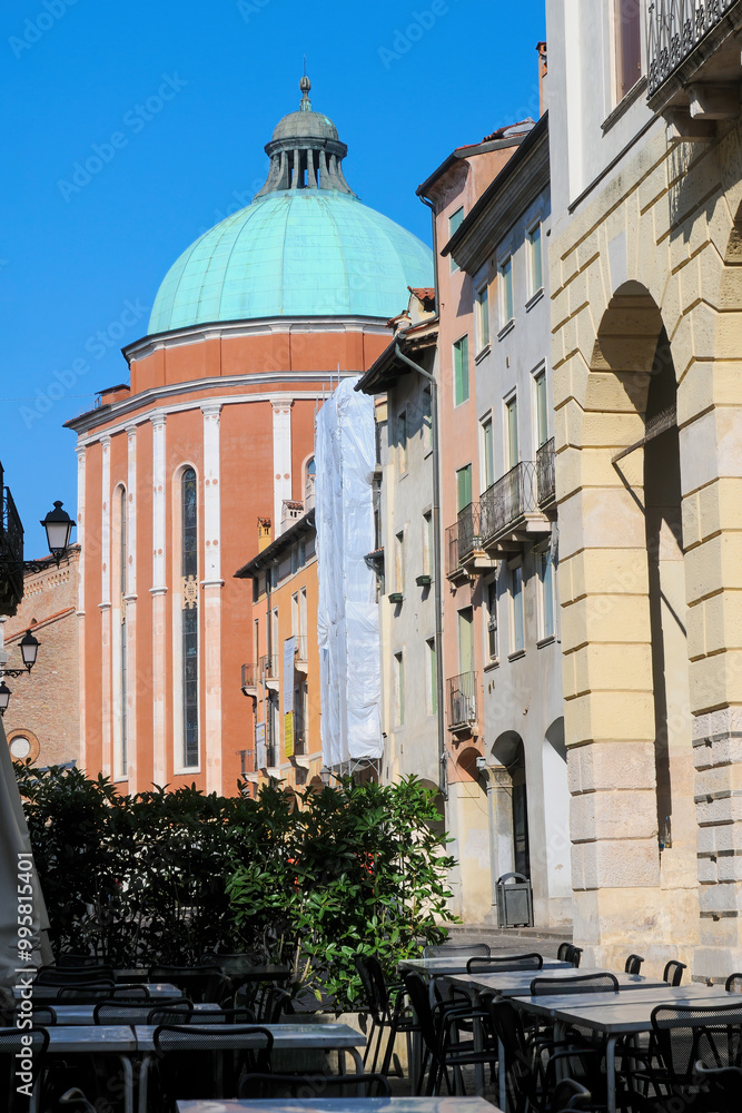 Picturesque Vicenza street scene featuring a striking terracotta ...
