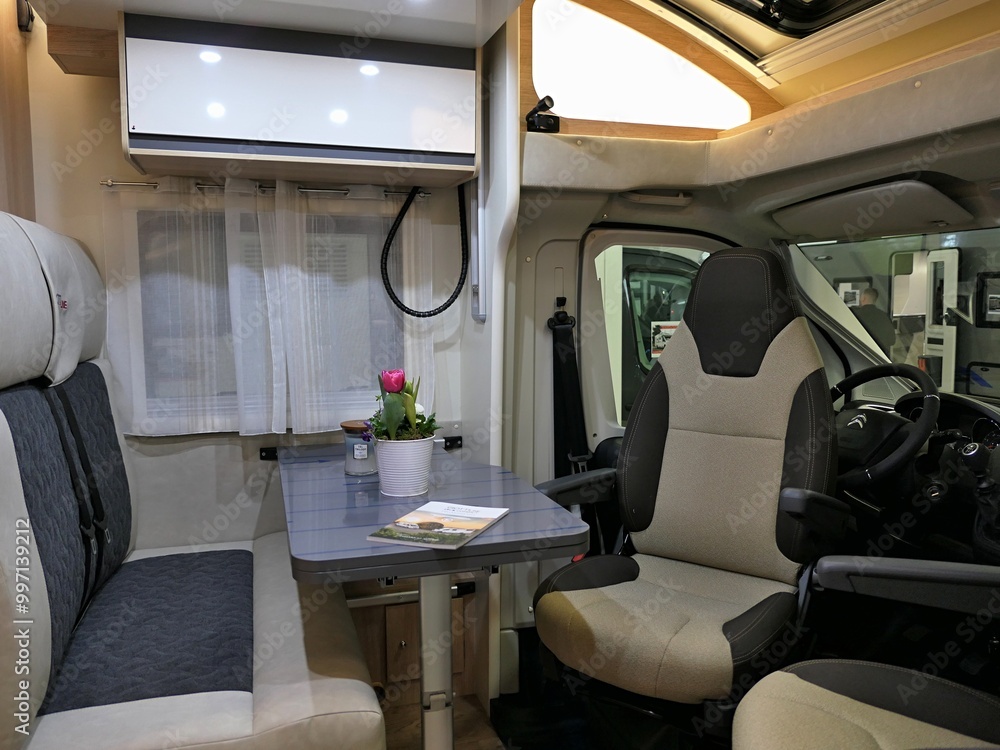 Dining table, rear seats and front seats in dining position in modern ...