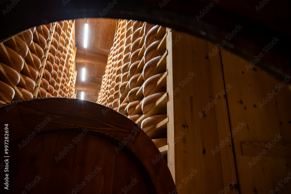 Aging rooms with shelves in cheese caves, central location for aging of ...