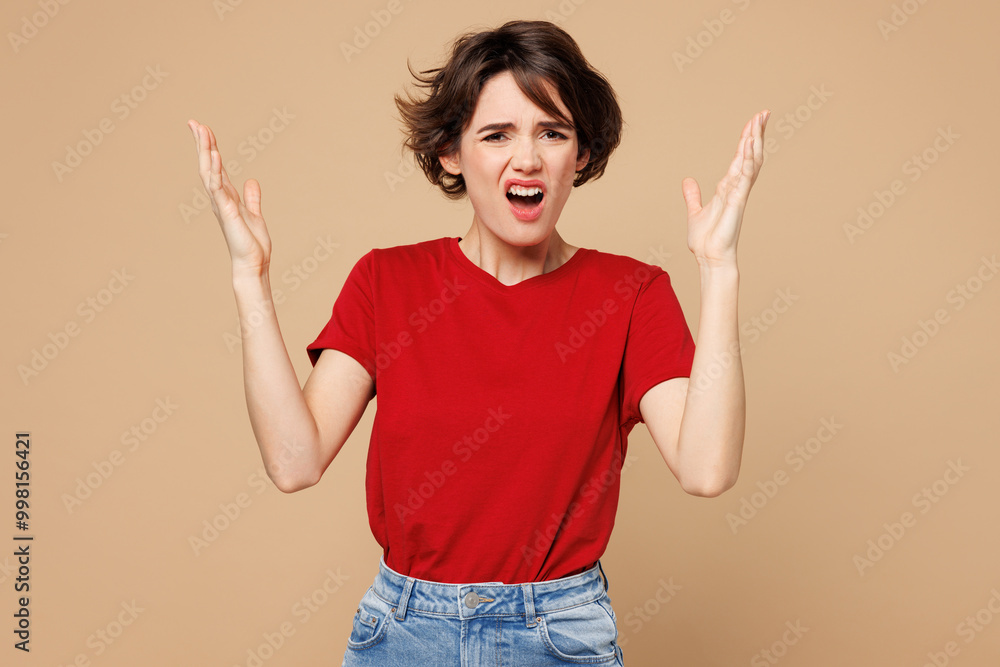 Young sad angry nervous dissatisfied woman she wear red t-shirt casual ...
