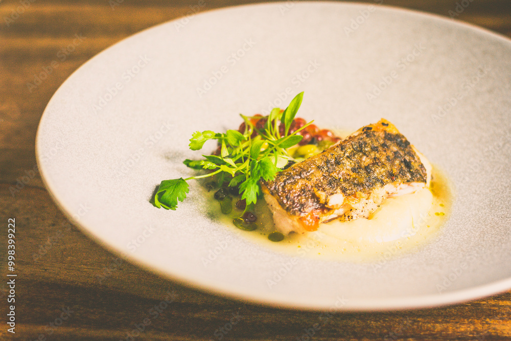 Threadfin with yucca mash, fermented tomato fish jus, laksa oil ...